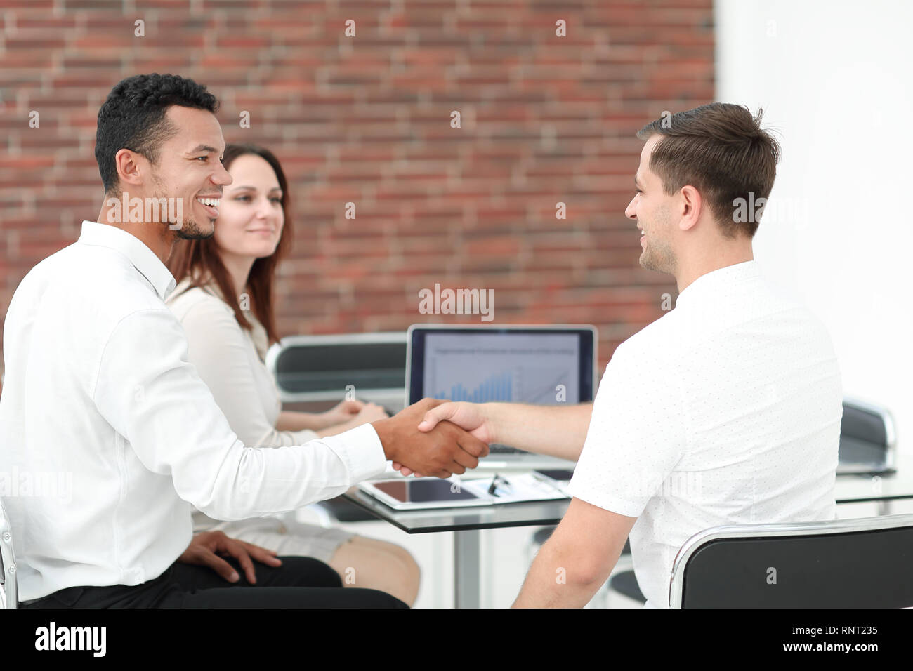 handshake business colleagues for a work Desk Stock Photo - Alamy
