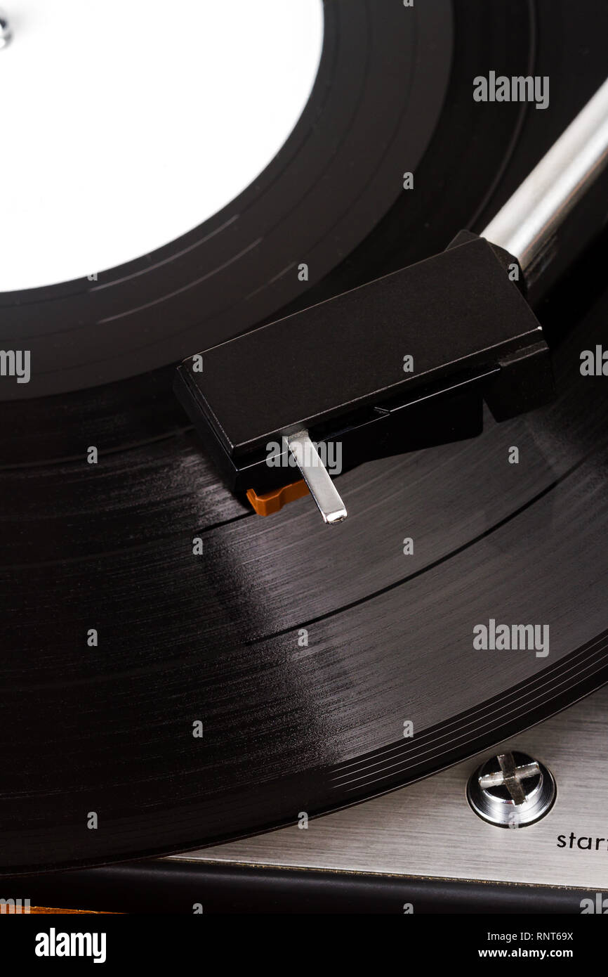 Close up of turntable needle on a vinyl record. Turntable playing vinyl ...