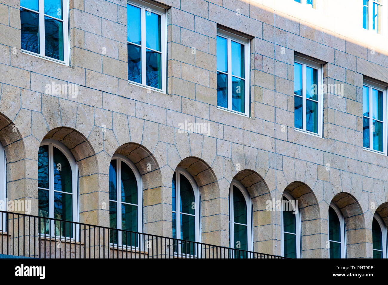 Architecture with rectangular and oval windows on a brick house Stock ...