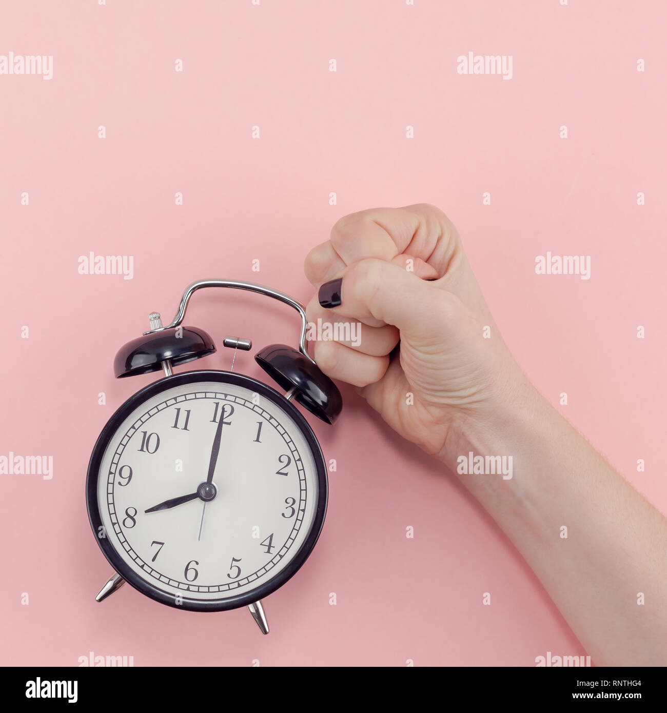 Creative flat lay morning time emotions concept top view of woman hand ...