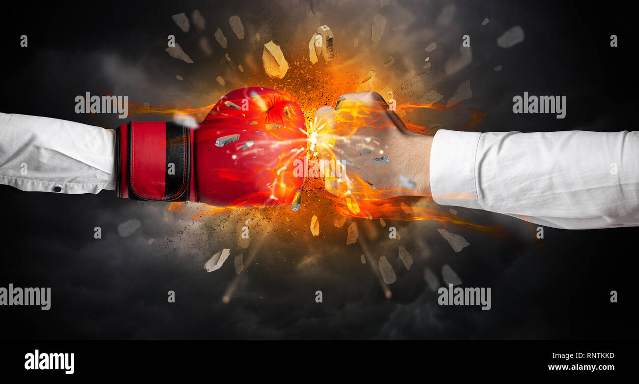 Two hands fighting and breaking a rock into small pieces Stock Photo ...