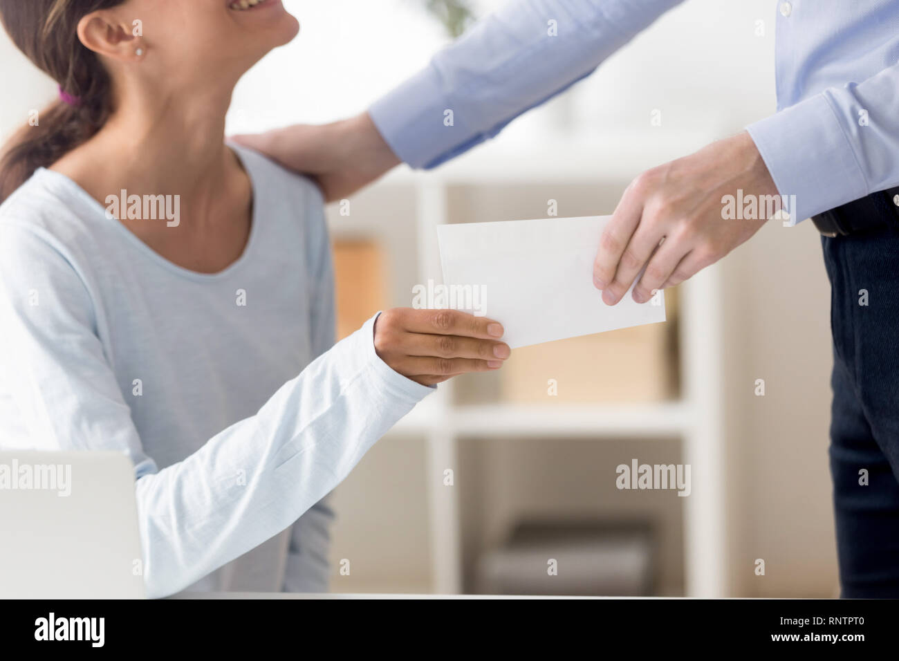 Cropped image female employee taking envelope with money Stock Photo ...