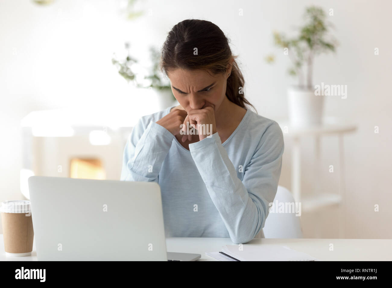 Woman nervous at computer hi-res stock photography and images - Alamy