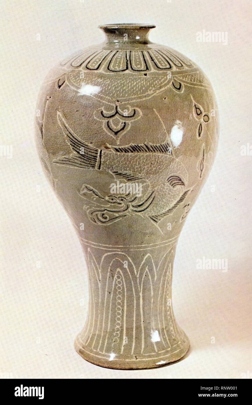 Celadon Prunus Vase with Inlaid Fish-dragon Design Stock Photo - Alamy