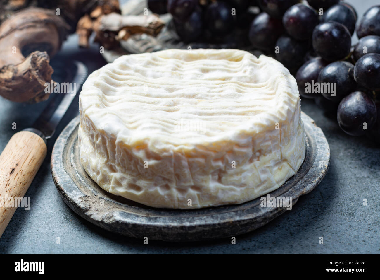 French soft Camembert cheese, original Camembert de Normandie, close up ...