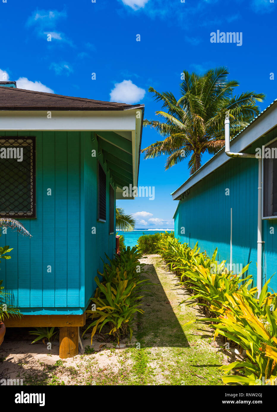 Wooden buildings on the background of the ocean, Cook Islands, South ...