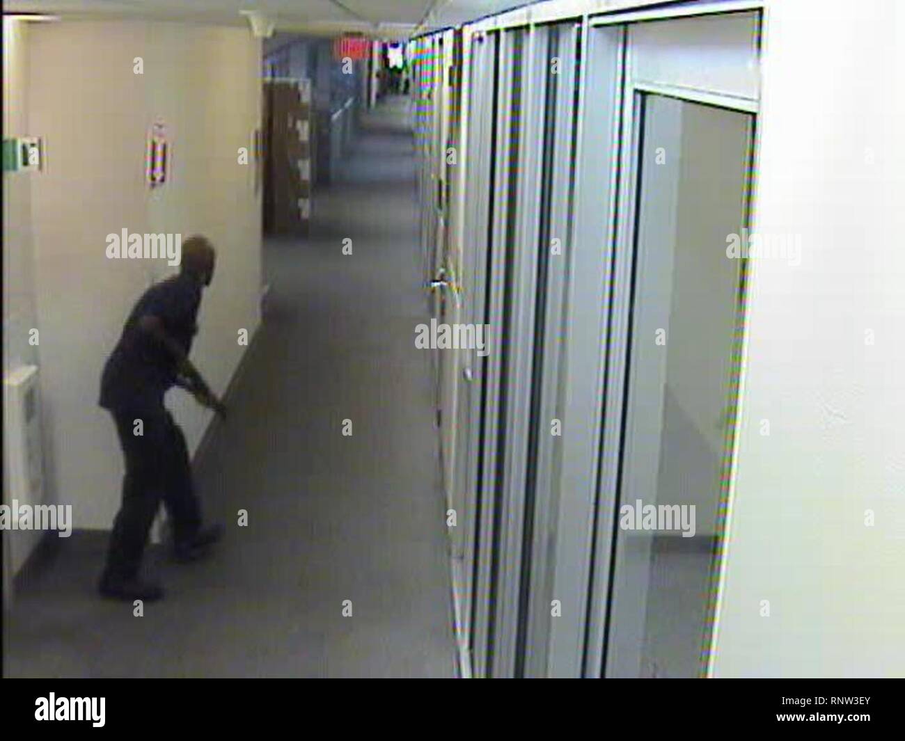 CCTV 2 of Aaron Alexis in building 197 Stock Photo - Alamy