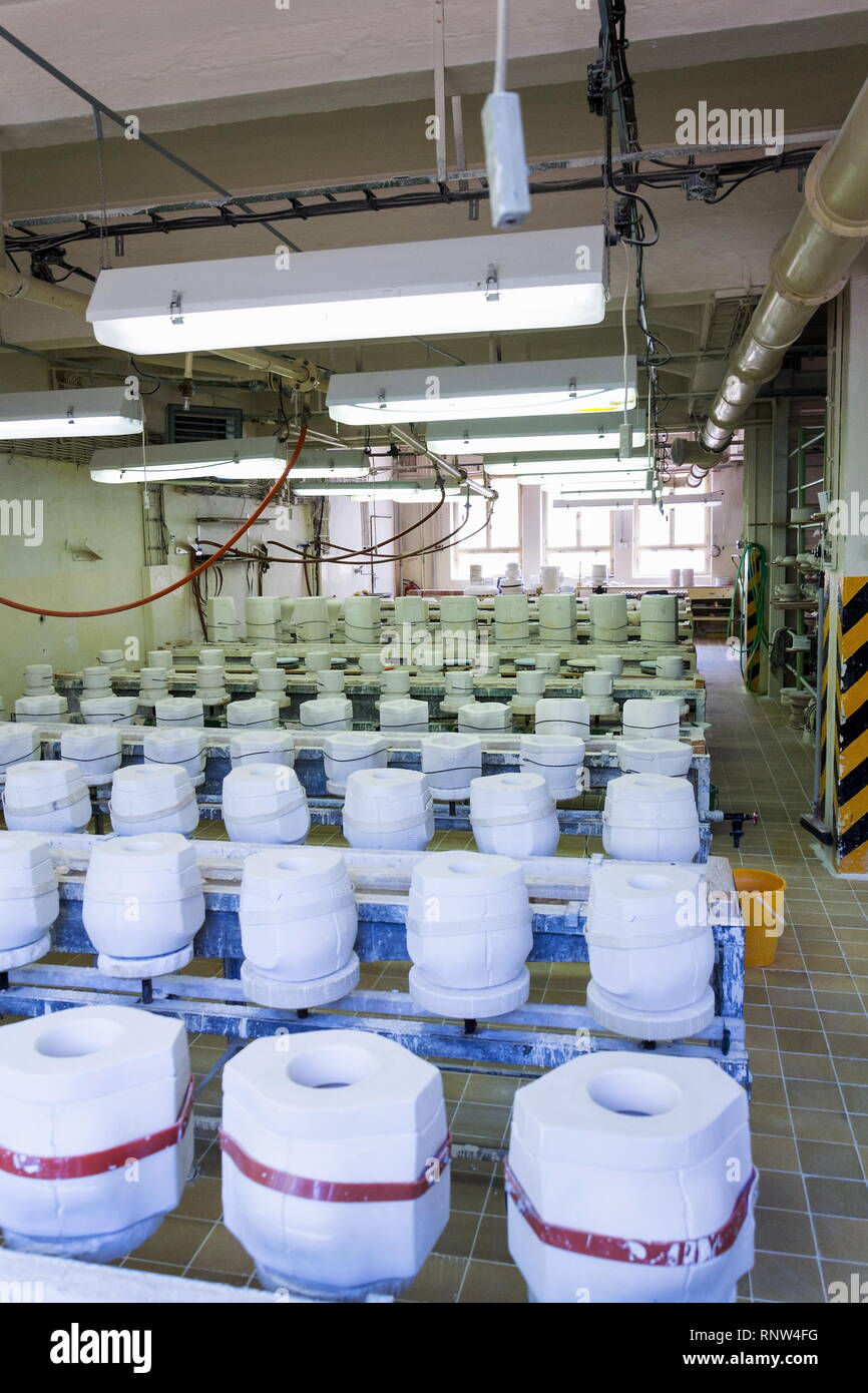 Traditional ceramics pottery on production line in factory Stock Photo ...
