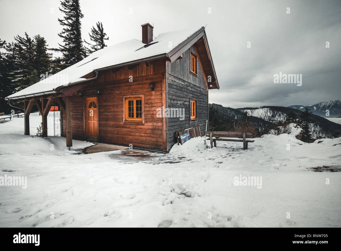 Snow covered house in the winter woods Stock Photo - Alamy