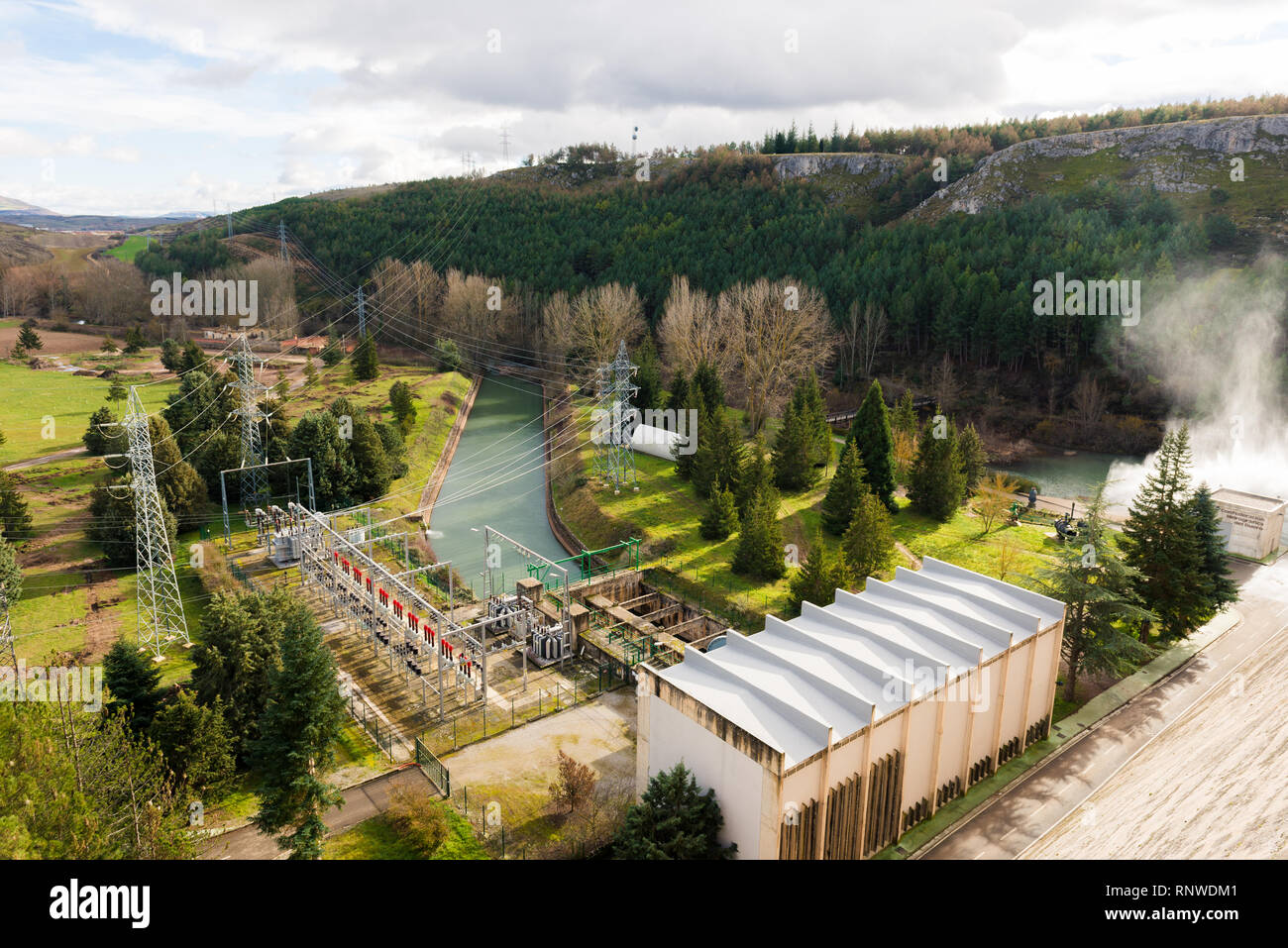 Contemporary hydroelectric power station in landscape Stock Photo - Alamy