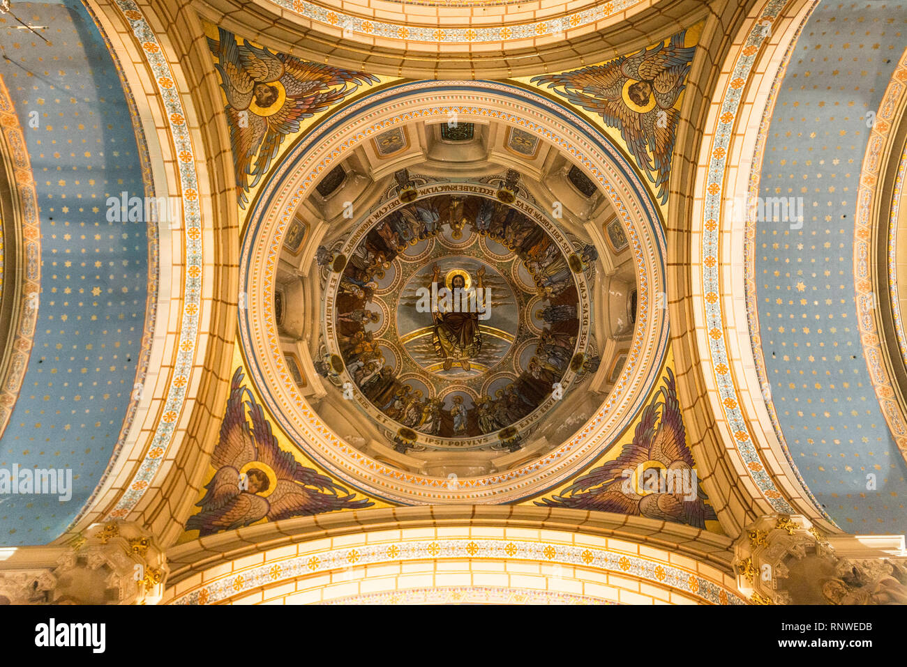 From below of golden mural on round ceiling of cathedral in Oviedo ...