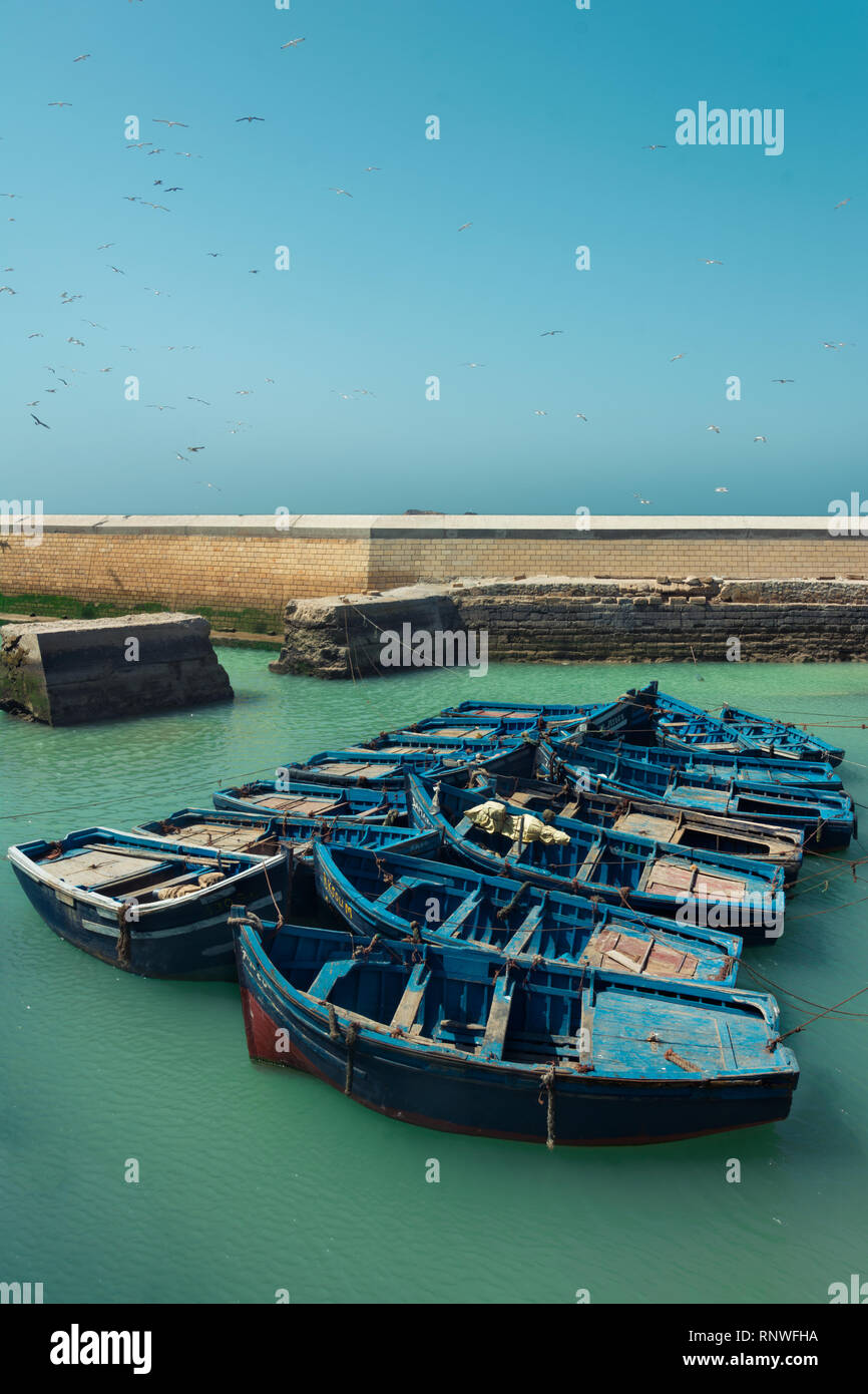 Blue fishing boats in port Stock Photo - Alamy