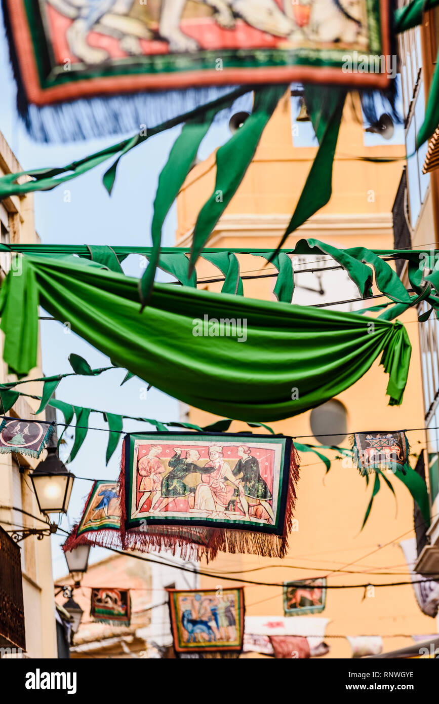 Valencia, Spain - January 27, 2019: Medieval banners hanging between ...