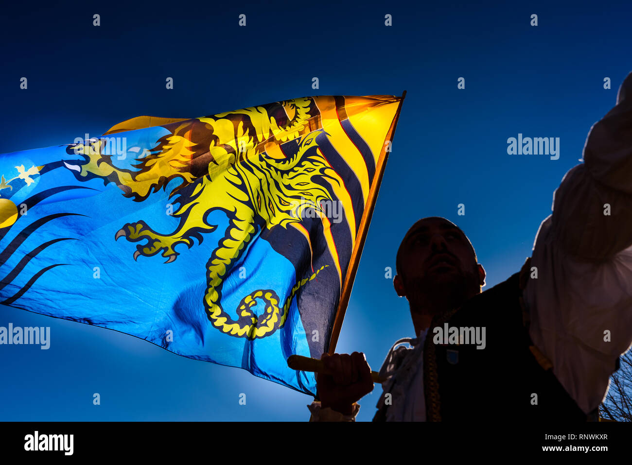 Traditional Italian dance of the flag-wavers Sbandieratori doing stunts ...