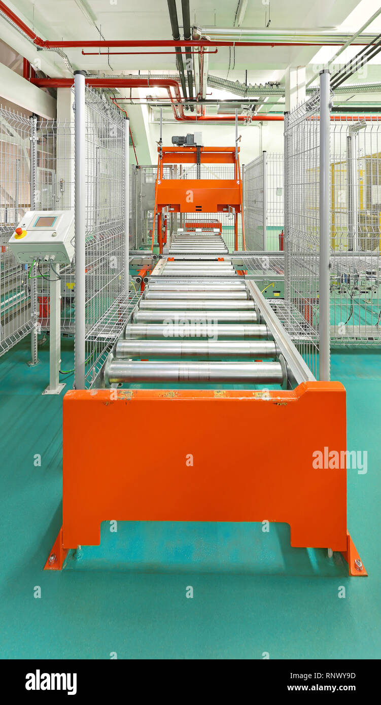 Coveyor Rollers Transport in Automated Warehouse Stock Photo - Alamy