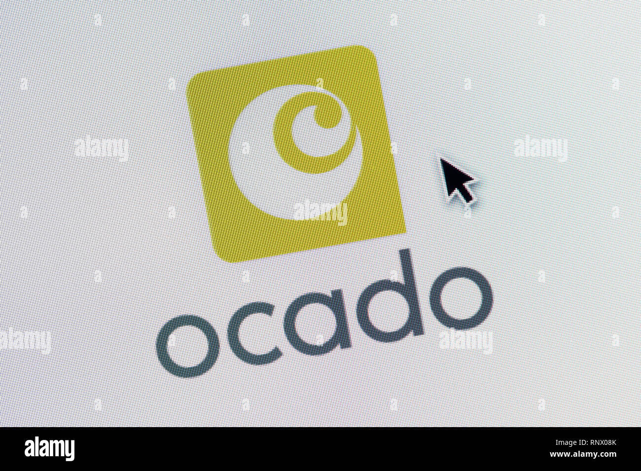 The logo of Ocado is seen on a computer screen along with a mouse ...