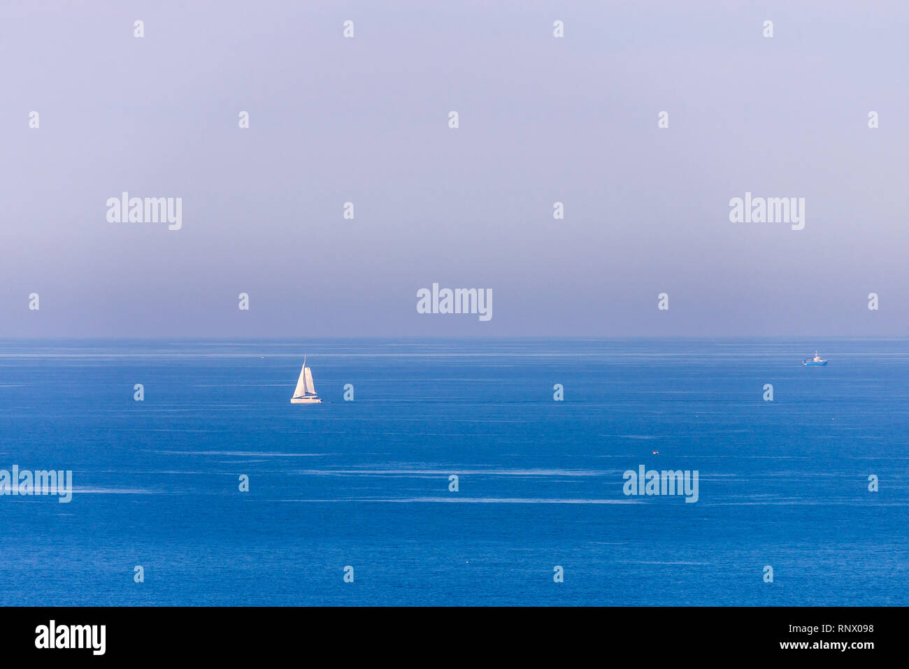 Boat racing across open ocean water. Boat speeding in the sea. Minimal ...