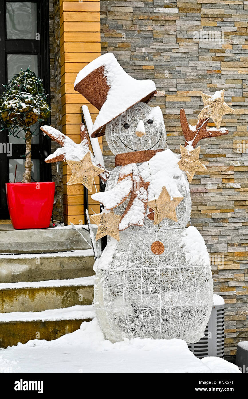 plastic snowman in snow Stock Photo - Alamy