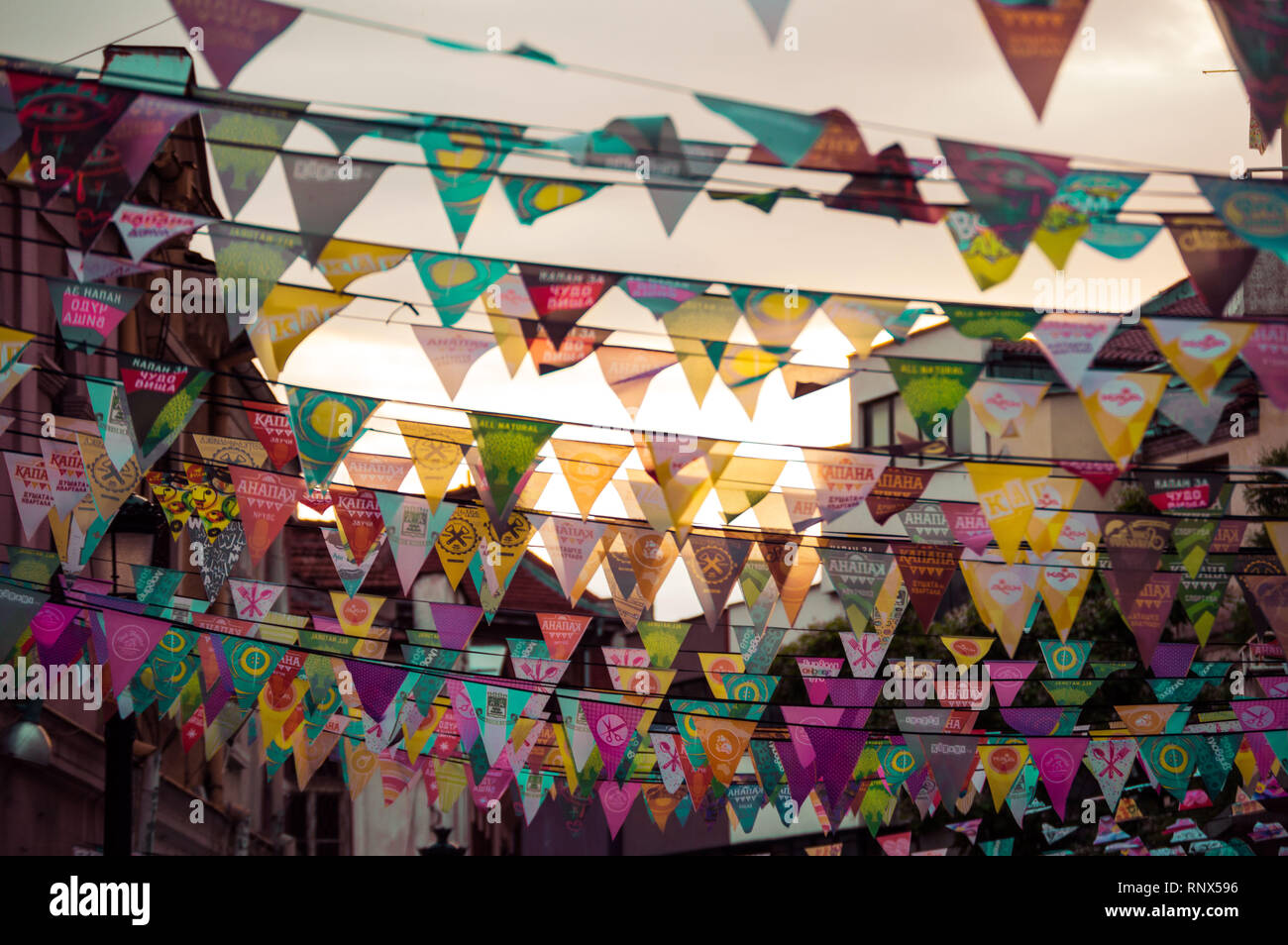 Festive flags on the street Stock Photo - Alamy