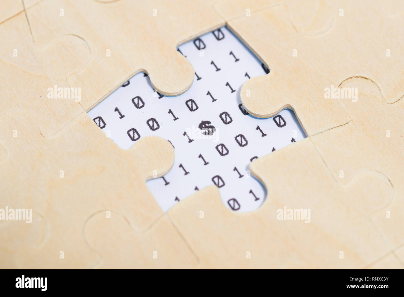 Puzzles with dollar codes, teamwork, information encryption Stock Photo ...