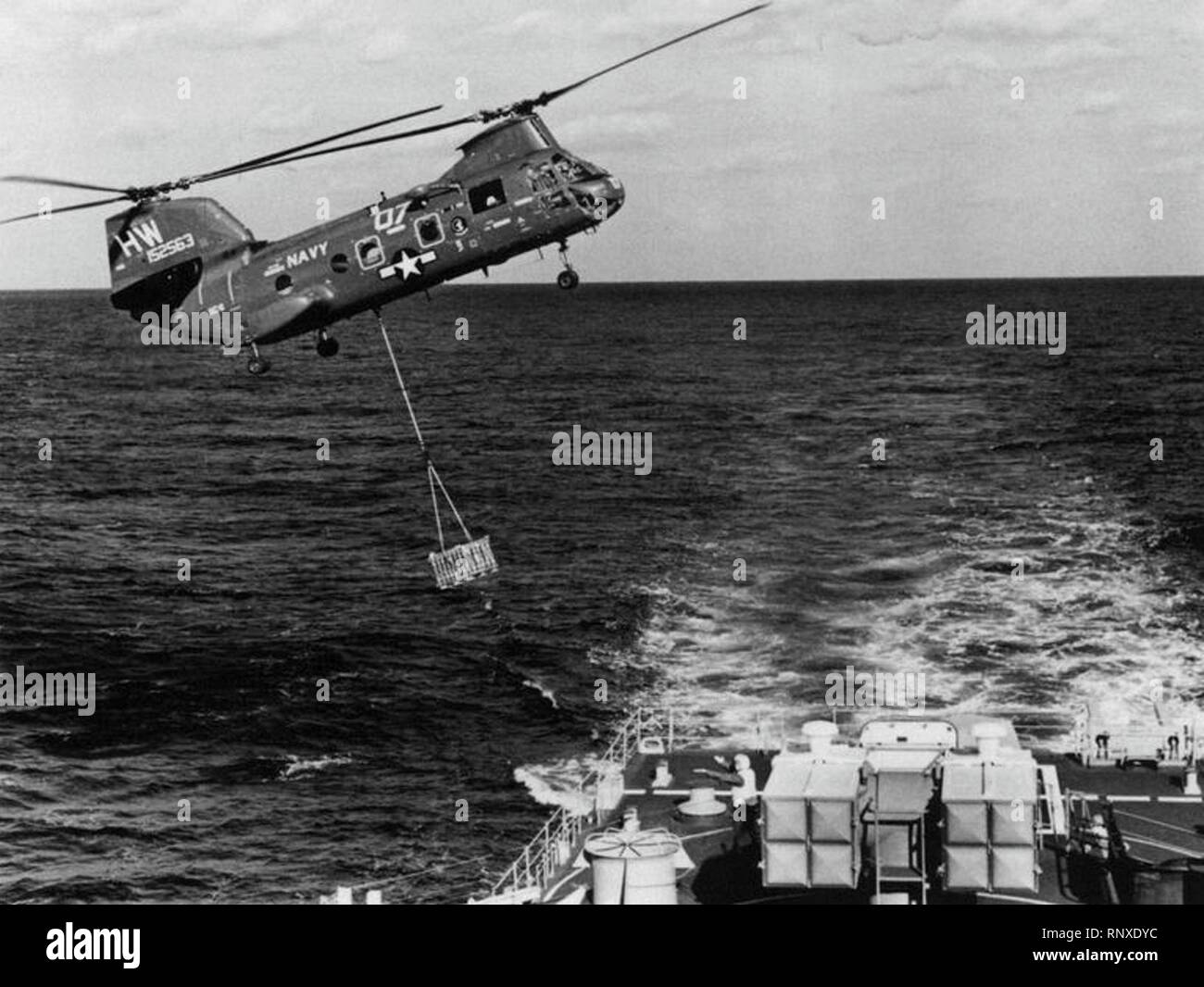 CH-46D Sea Knight of HC-6 replenishes USS Caron (DD-970), in 1981 Stock ...