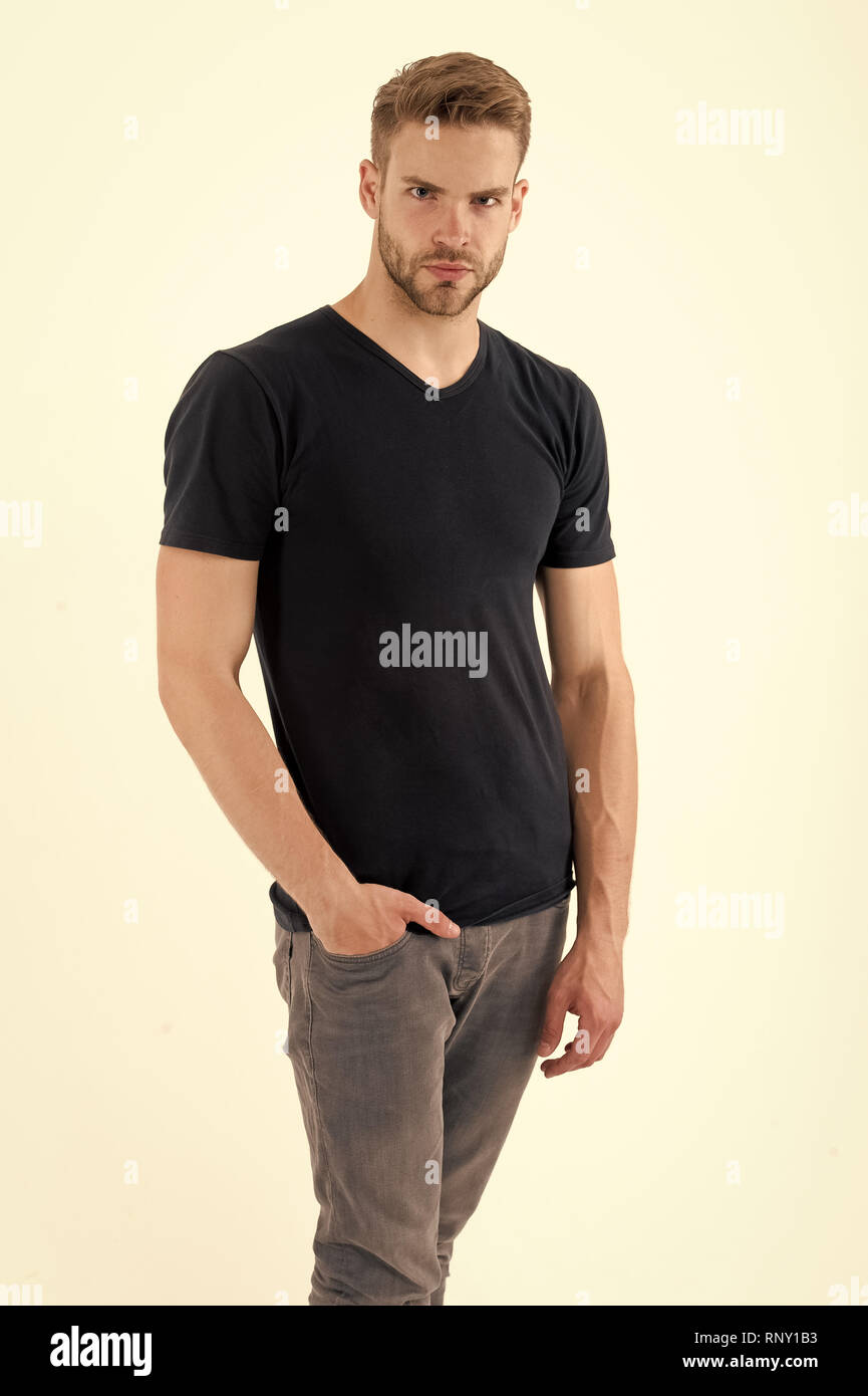 Bearded man with serious look isolated on white. Macho hold hand in ...