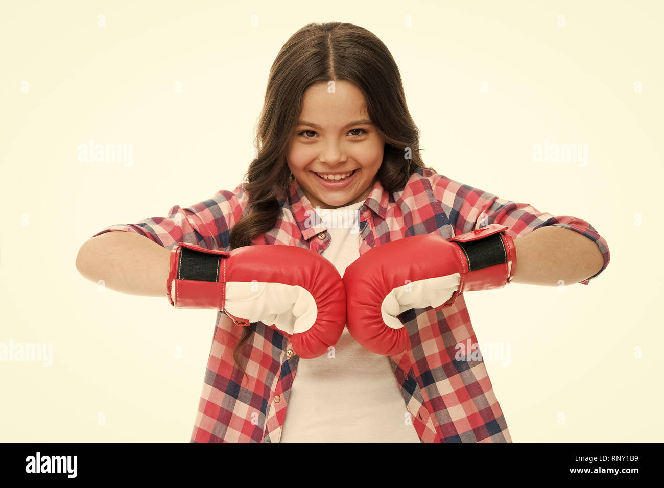 Happy girl in boxing gloves isolated on white. Little child smile in ...