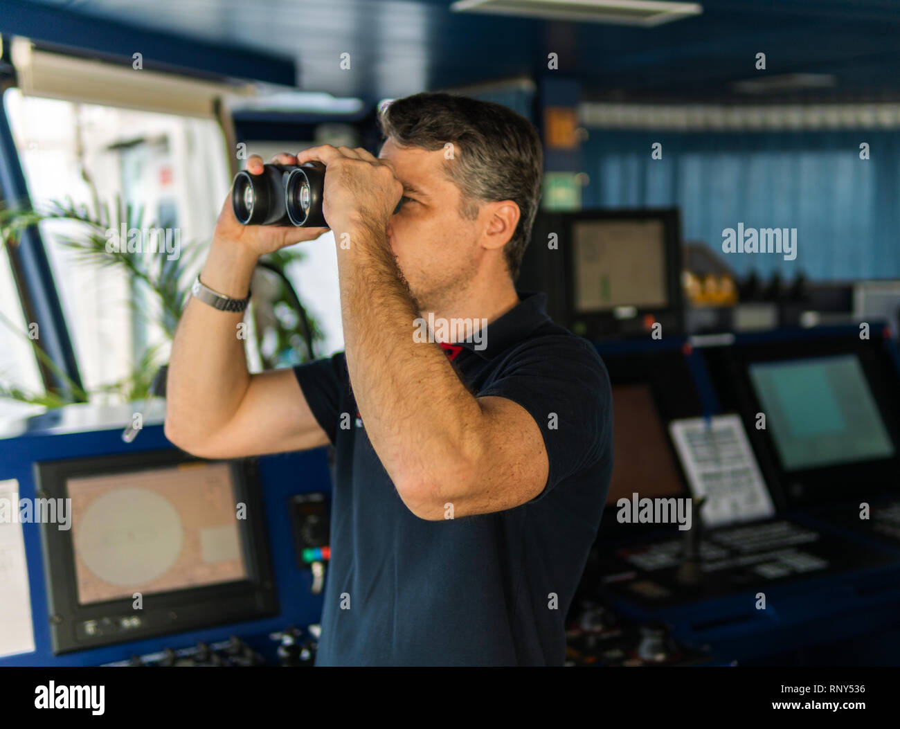 Ship and captain and binoculars hi-res stock photography and images - Alamy