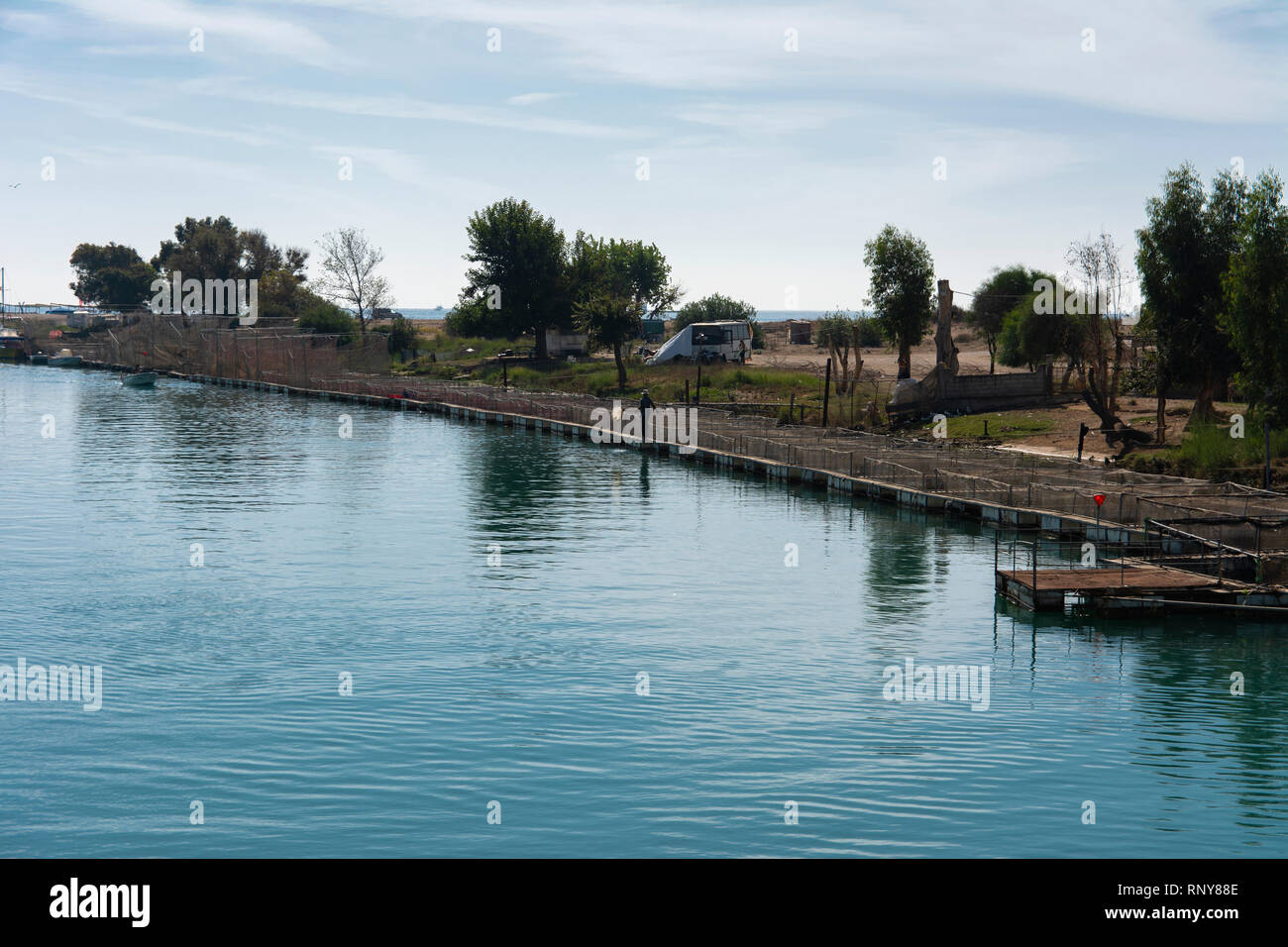 Artificial breeding of fish. Tanks from the net in the open air farm ...