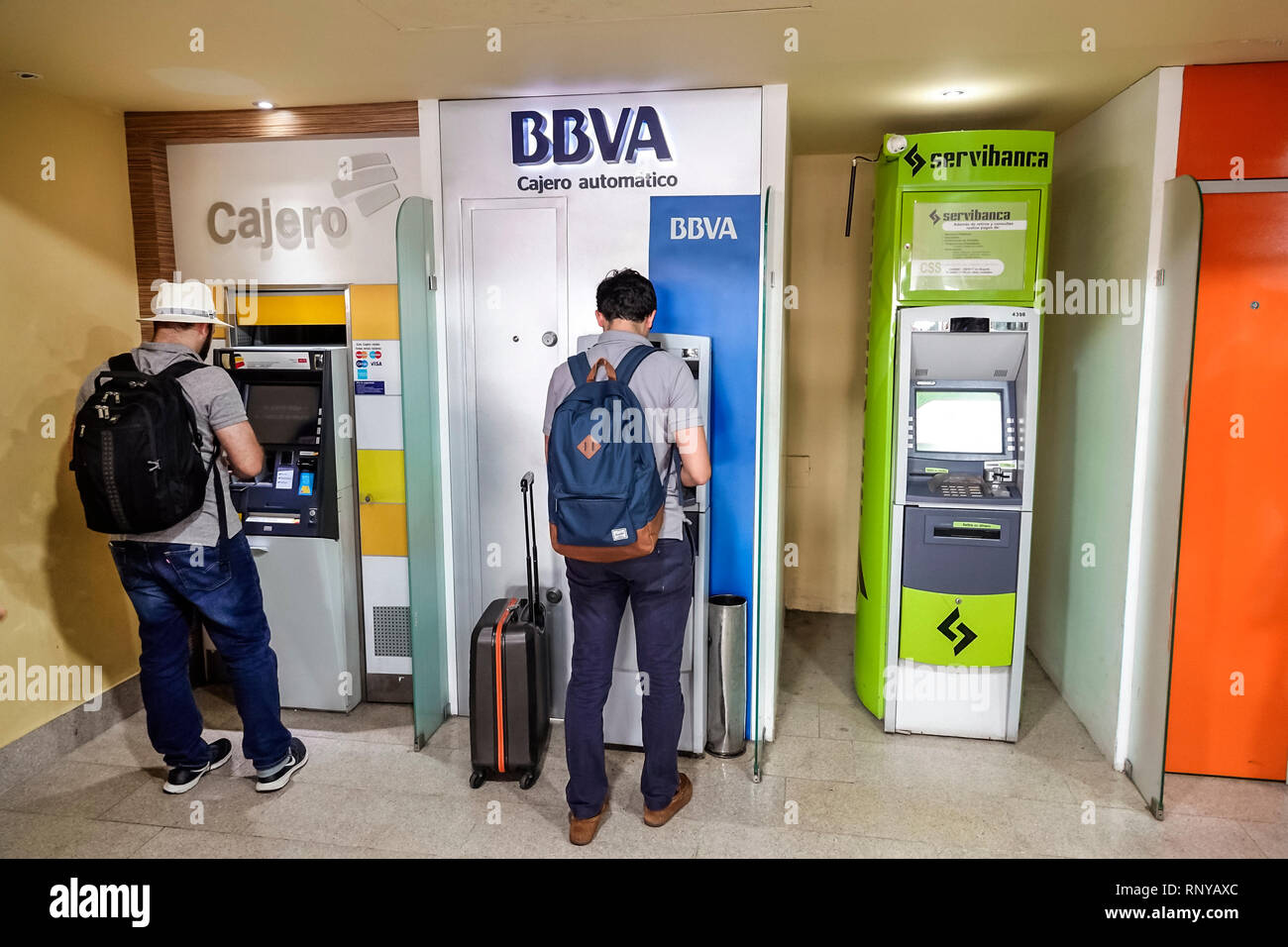 Atm machine in airport terminal hi-res stock photography and images - Alamy