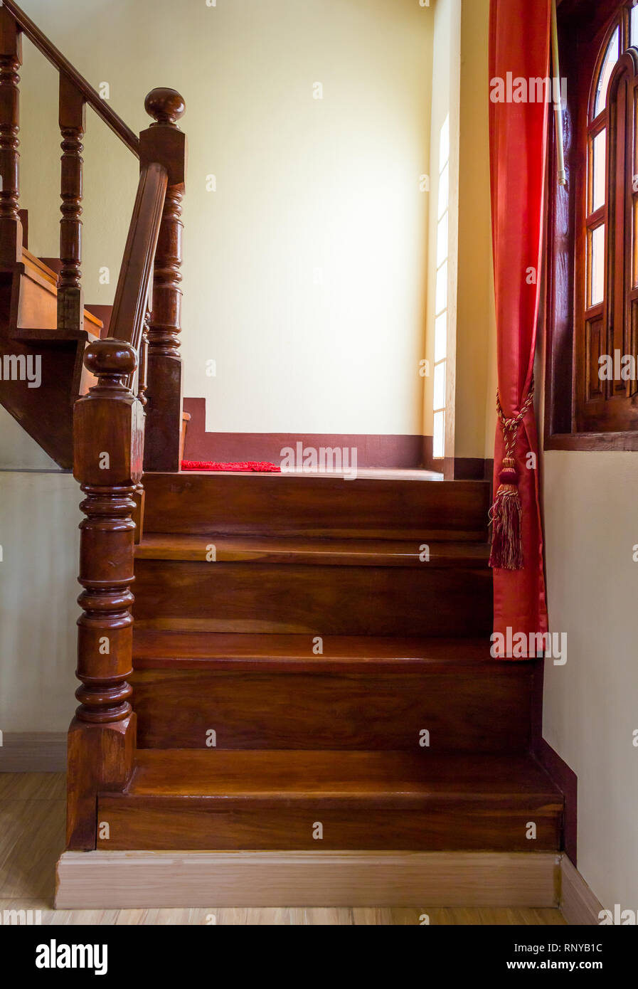 Modern ladder from dark wood Stock Photo - Alamy