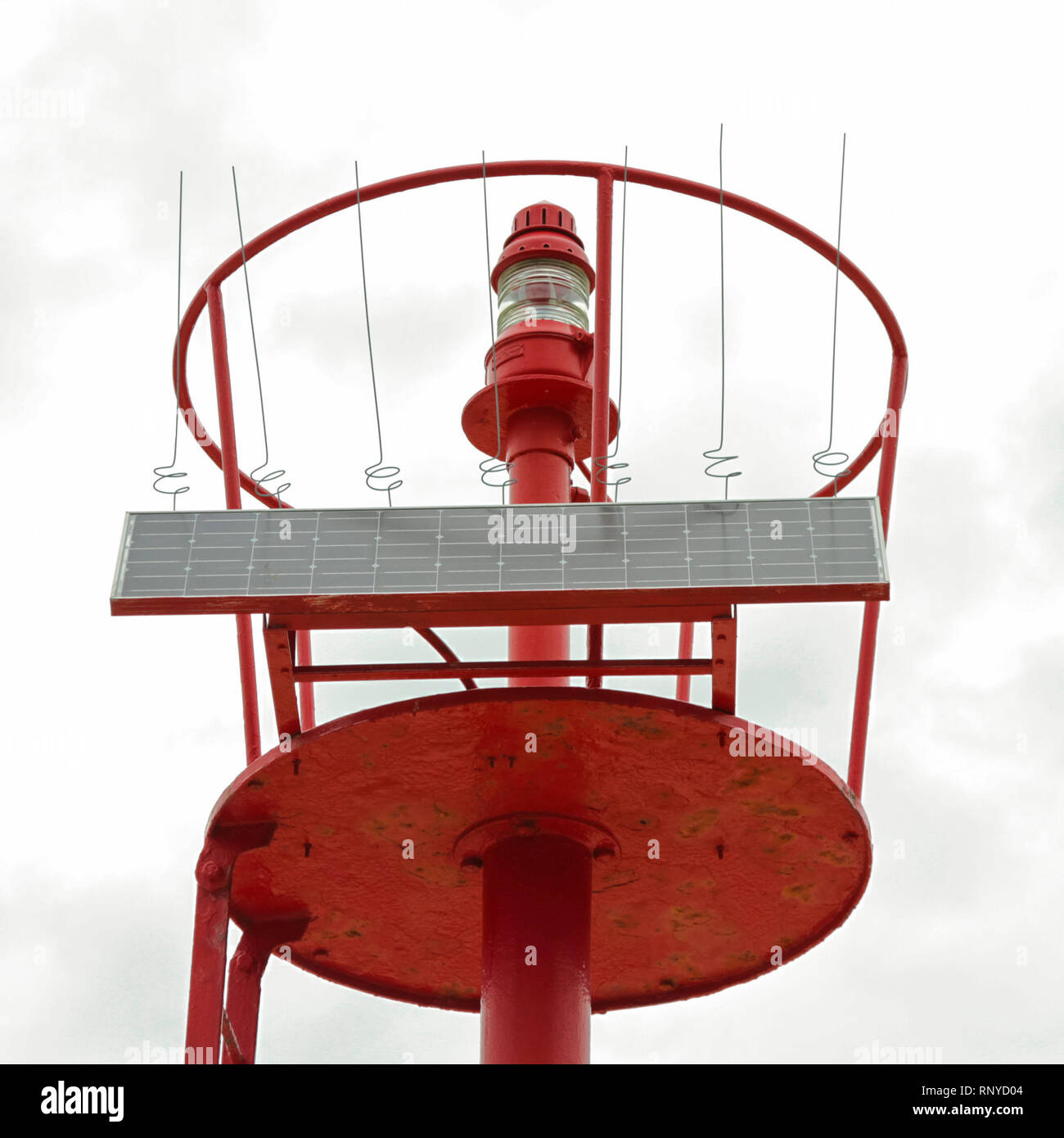 Red lighthouse strobe powered by solar cell Stock Photo - Alamy