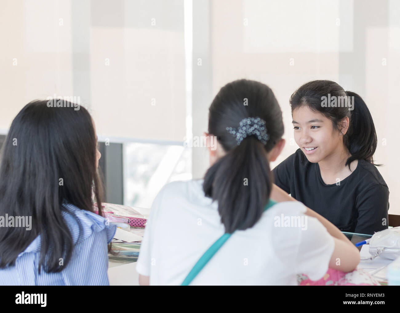 Group teens work together classroom hi-res stock photography and images ...