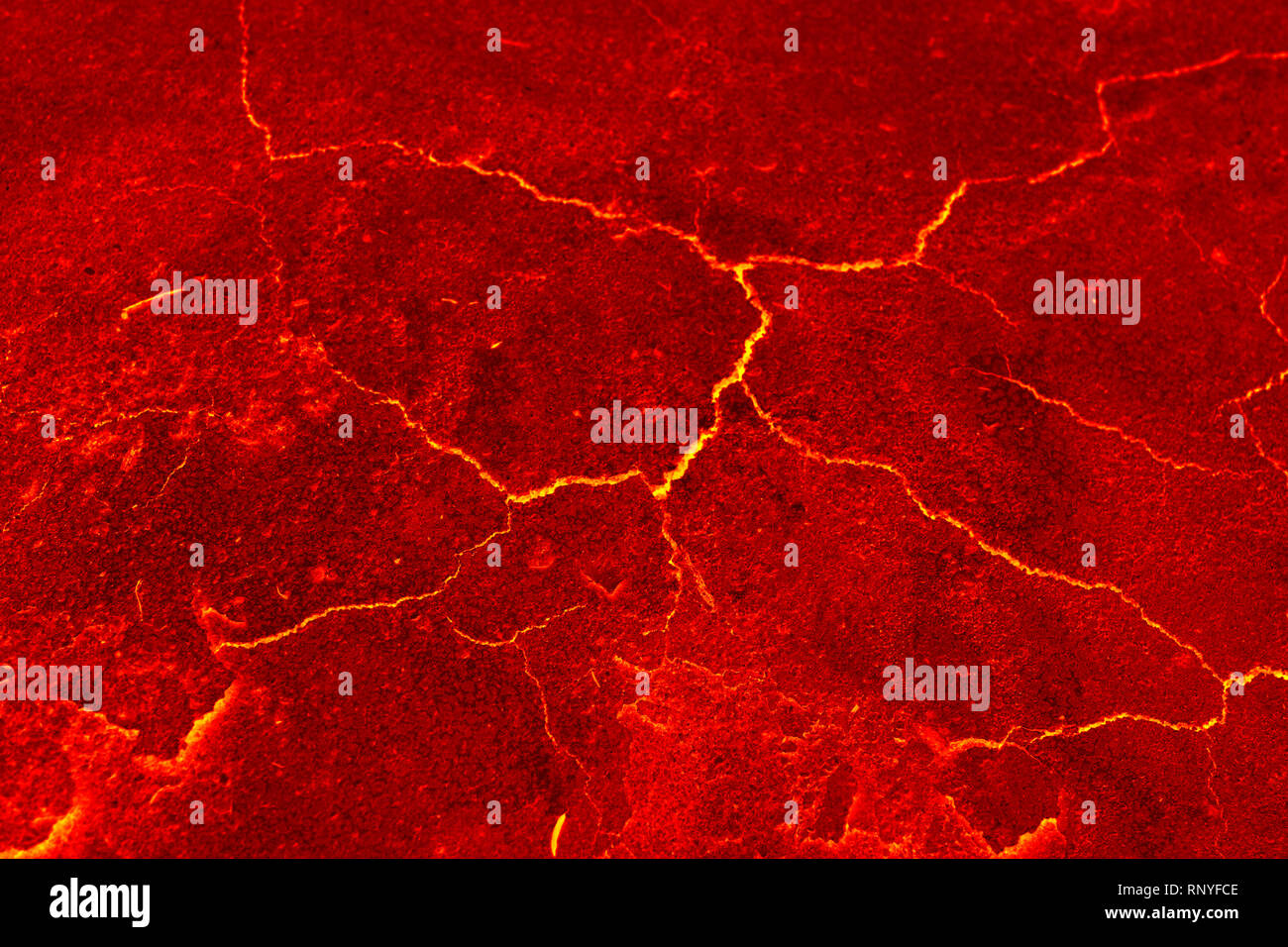 heat red cracked ground texture after eruption volcano Stock Photo - Alamy