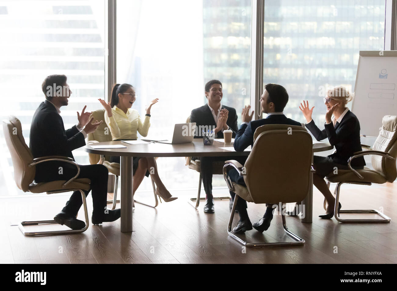 Business successful team cheering group hi-res stock photography and ...