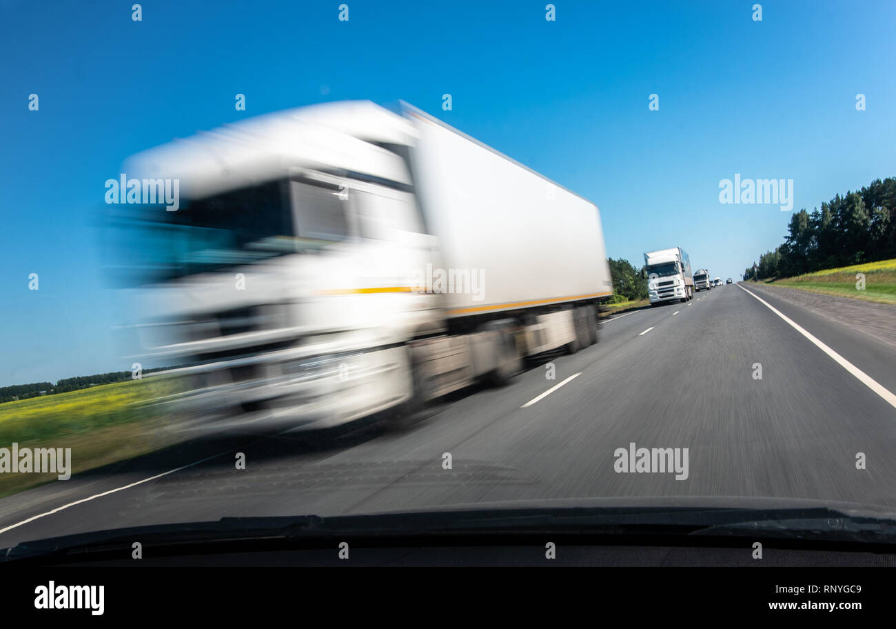 Delivery truck on highway with speed effect Stock Photo - Alamy