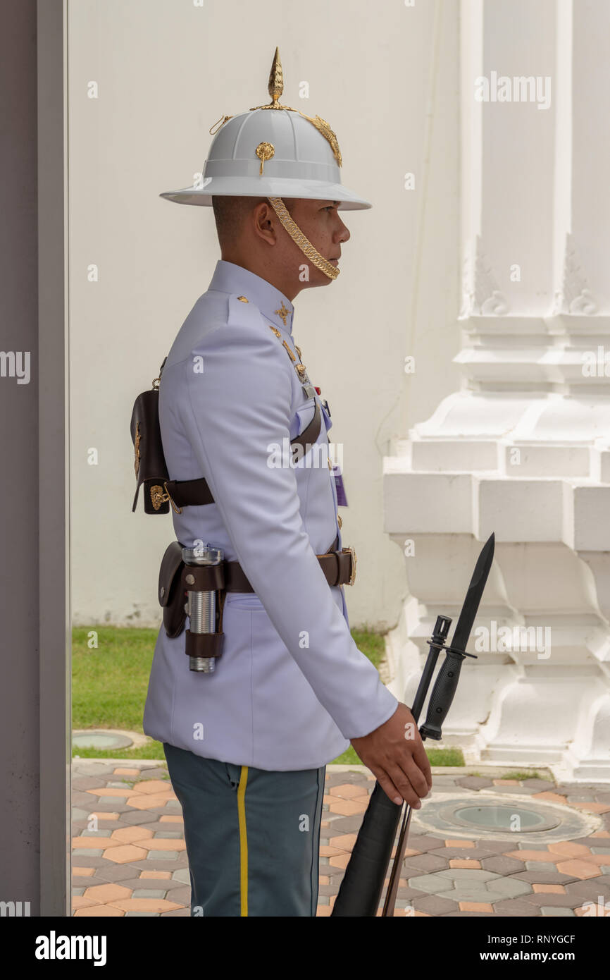 Close-up of Grand Palace guard with rifle Stock Photo - Alamy