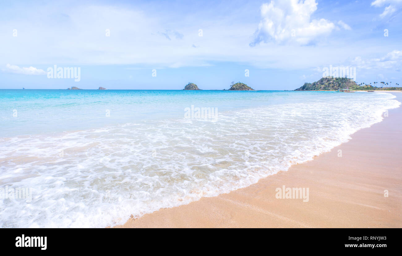 Beautiful amazing gold colored sandy beach with soft waves isolated ...