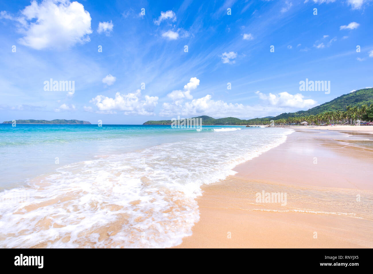 Beautiful amazing gold colored sandy beach with soft waves isolated ...