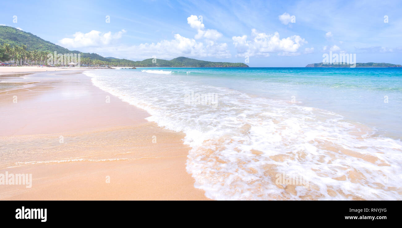 Beautiful amazing gold colored sandy beach with soft waves isolated ...