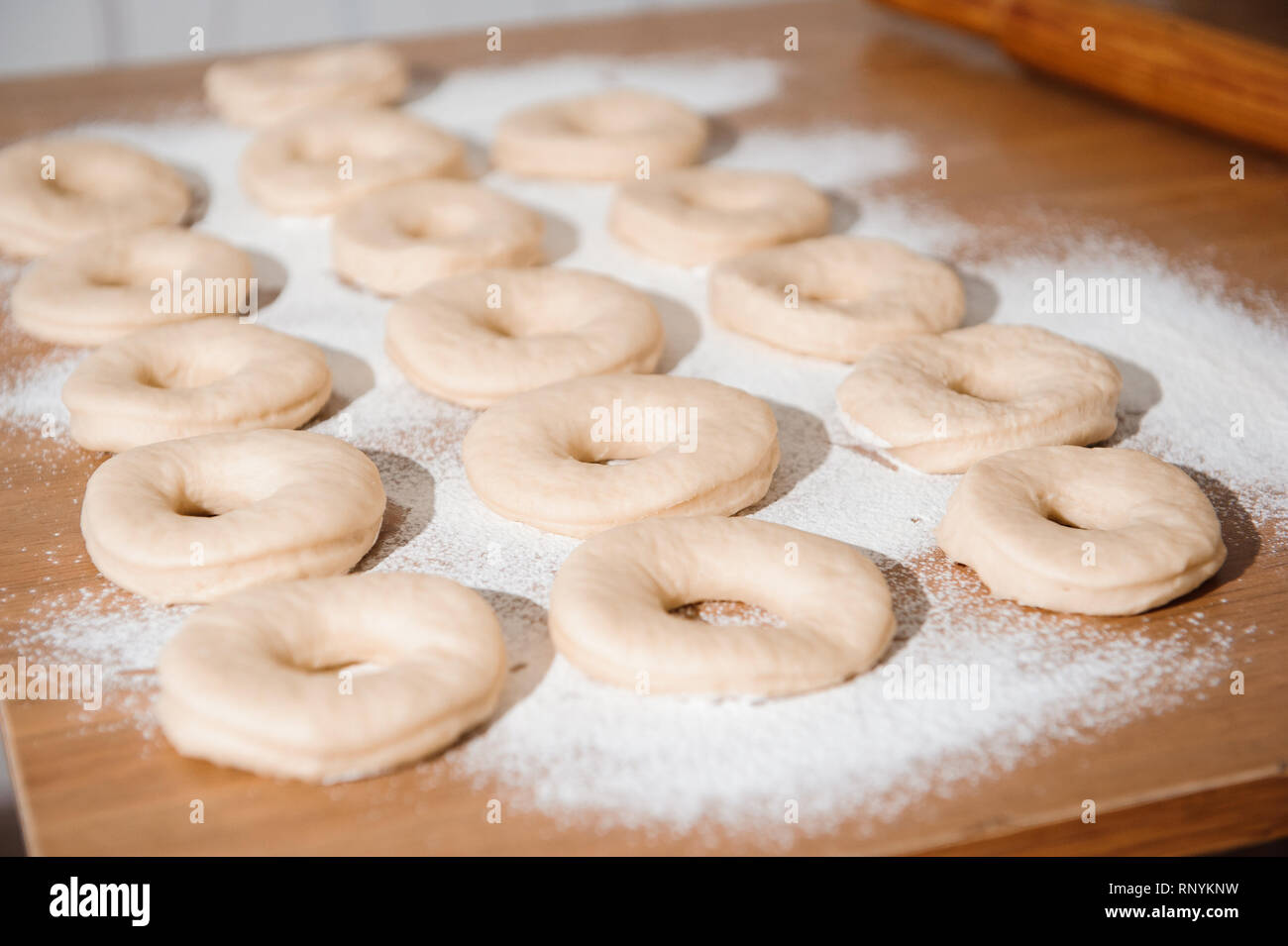 Chef preparing dough - cooking donuts process in the kitchen Stock ...