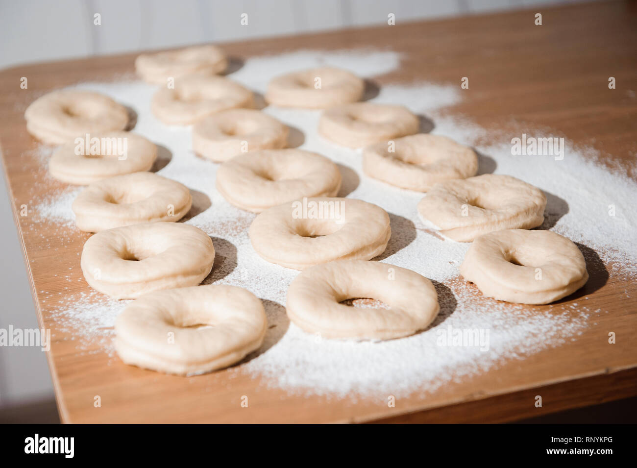 Chef preparing dough - cooking donuts process in the kitchen Stock ...