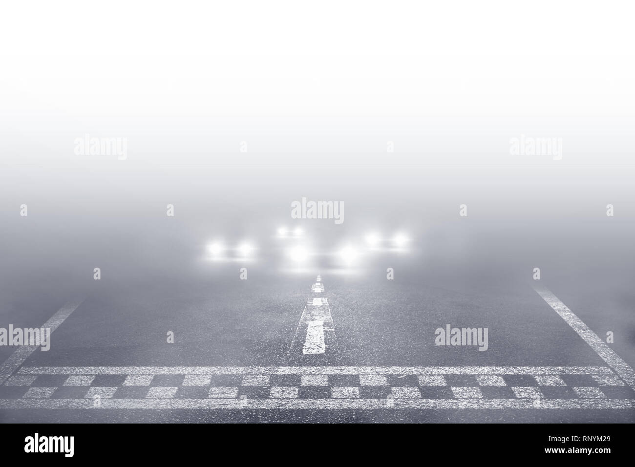 Finish line racing car driving the fog road Stock Photo - Alamy