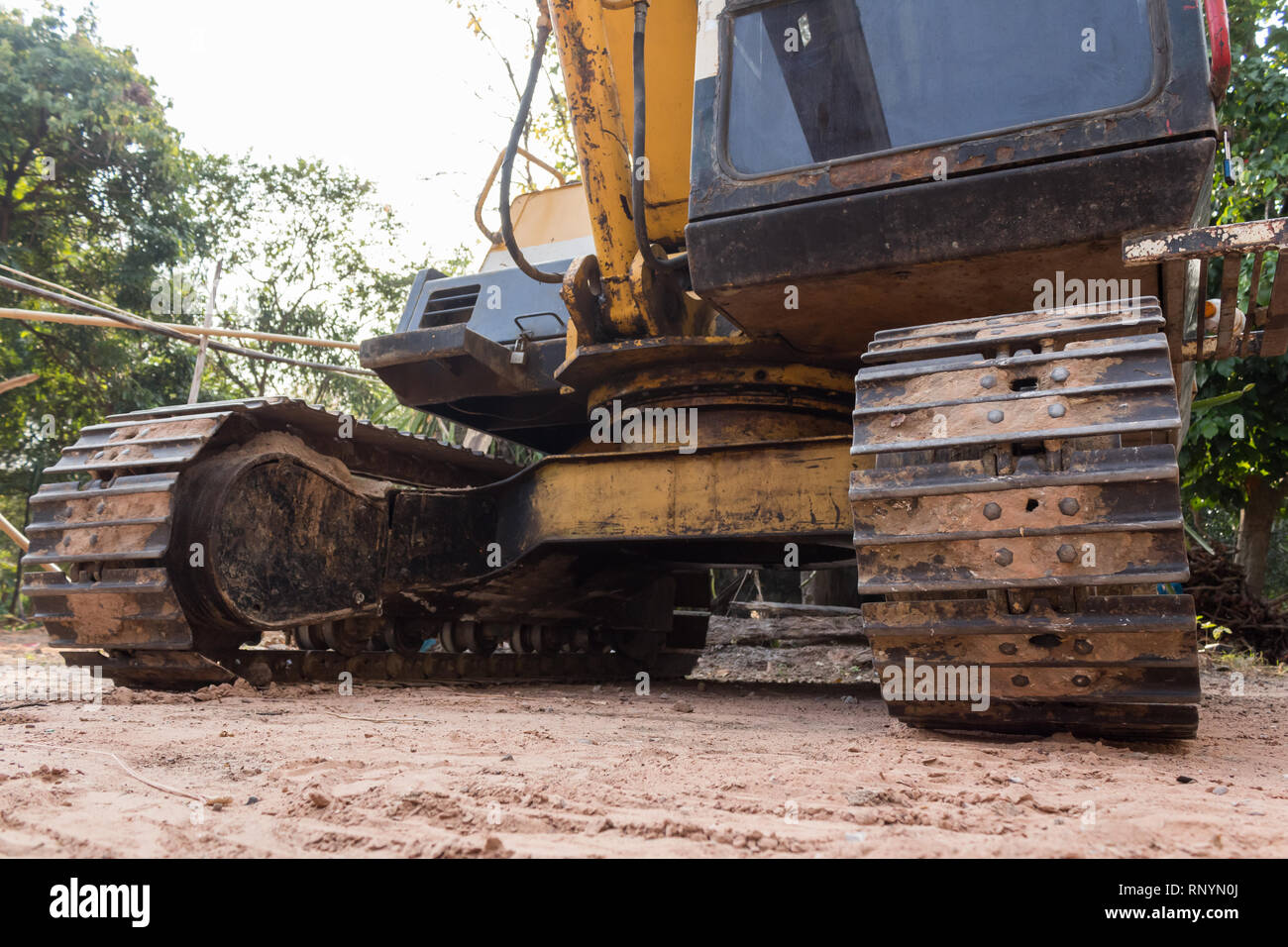 Excavator tracks industrial Stock Photo - Alamy