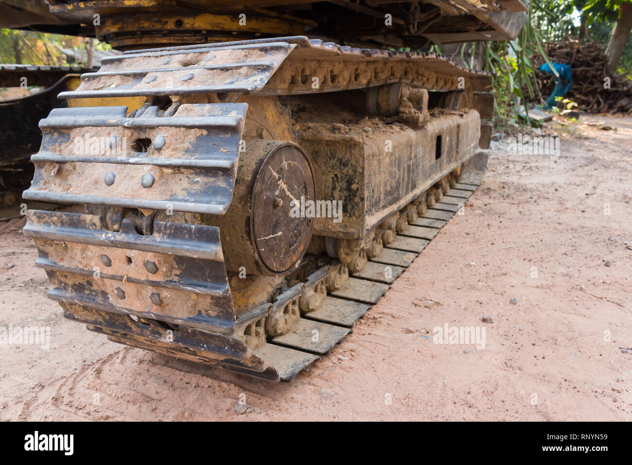 Excavator tracks industrial Stock Photo - Alamy
