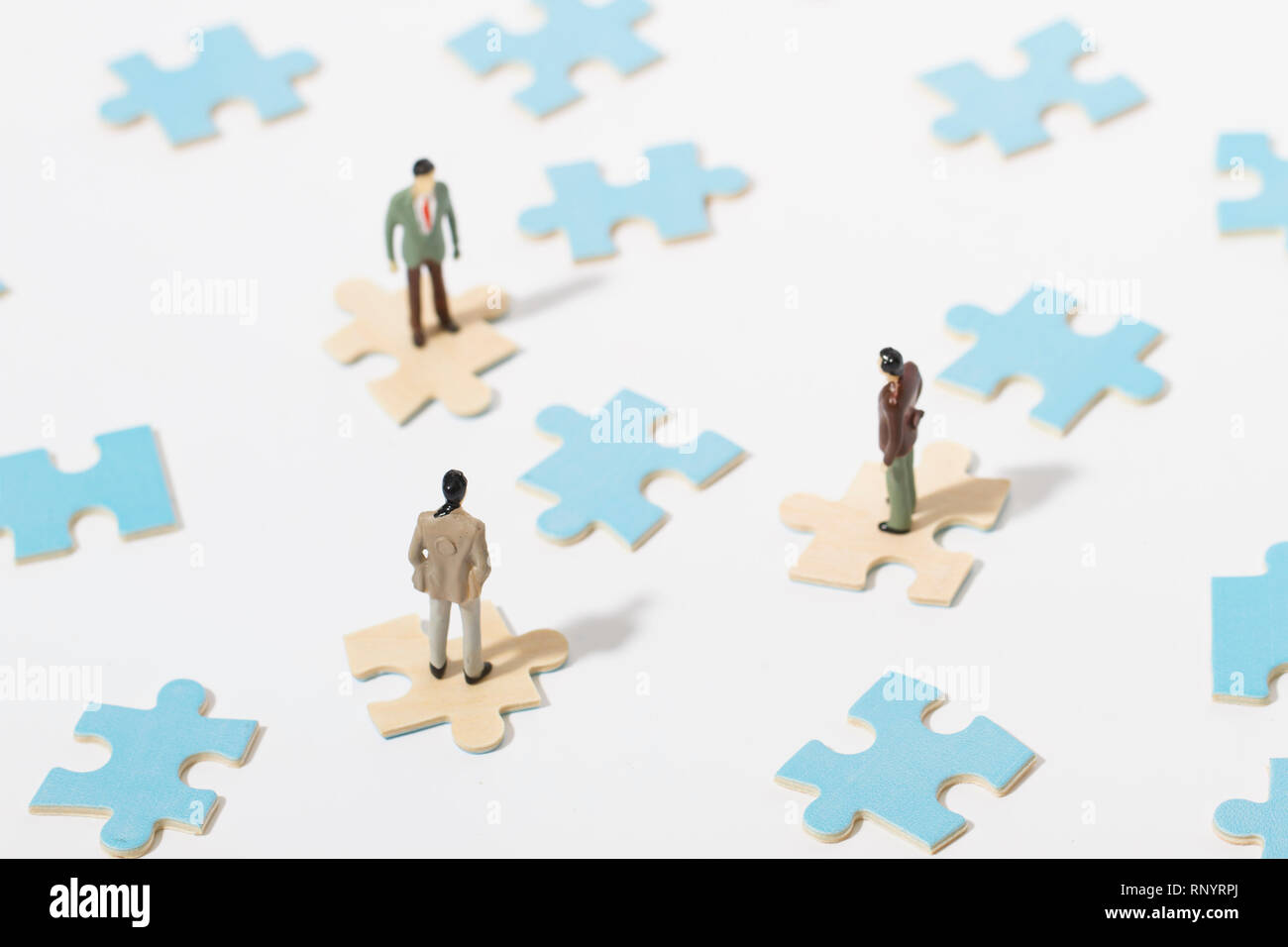 People and puzzles, teamwork Stock Photo - Alamy