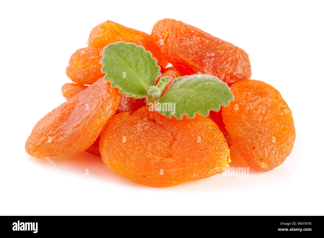 Dried apricots with mint leaves isolated on white background Stock ...