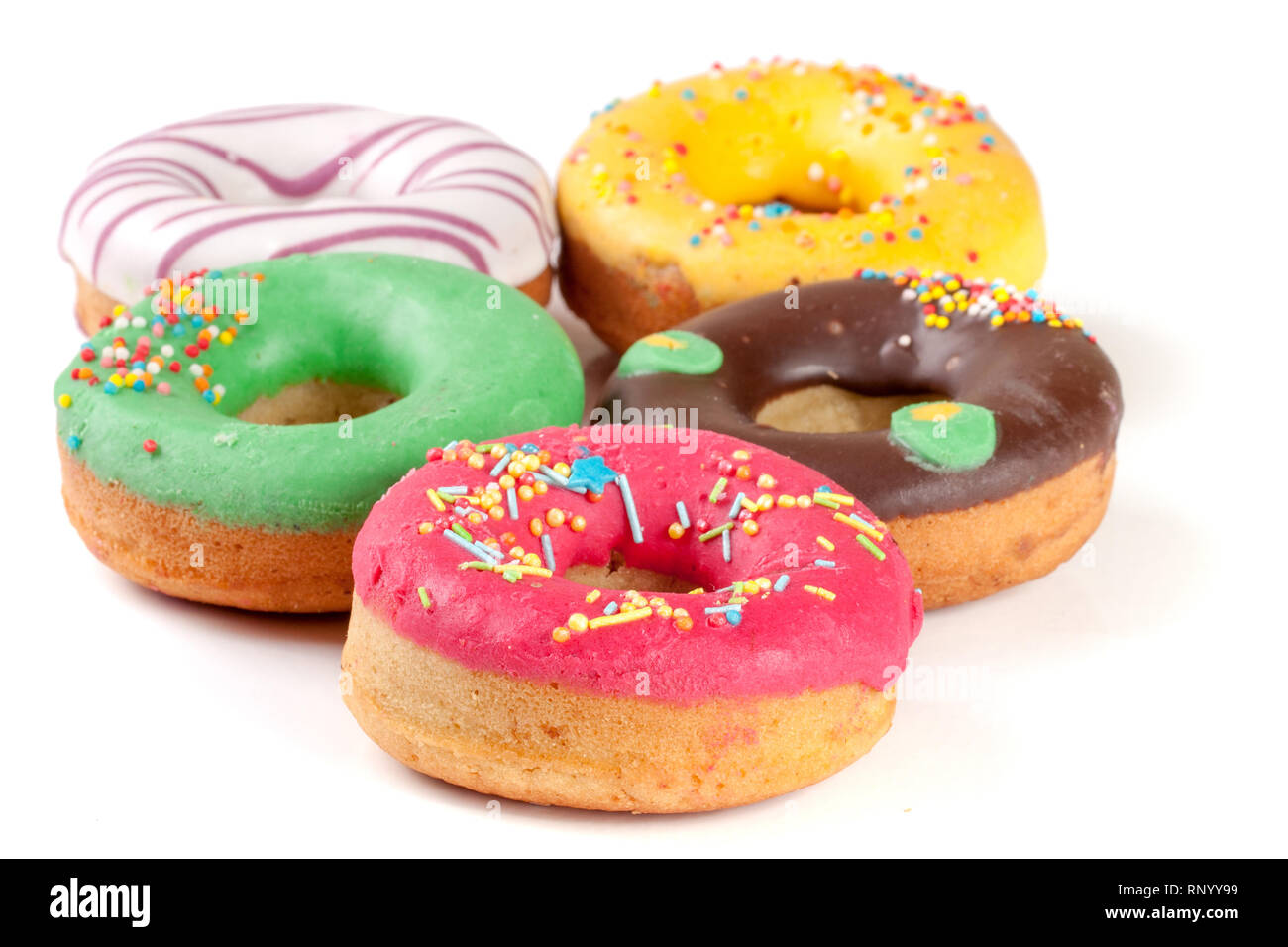 five glazed donut isolated on white background Stock Photo - Alamy