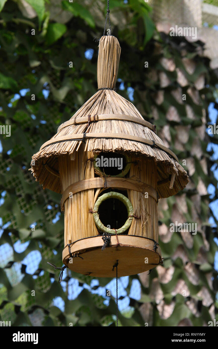 Wooden birdhouse in forest hi-res stock photography and images - Alamy