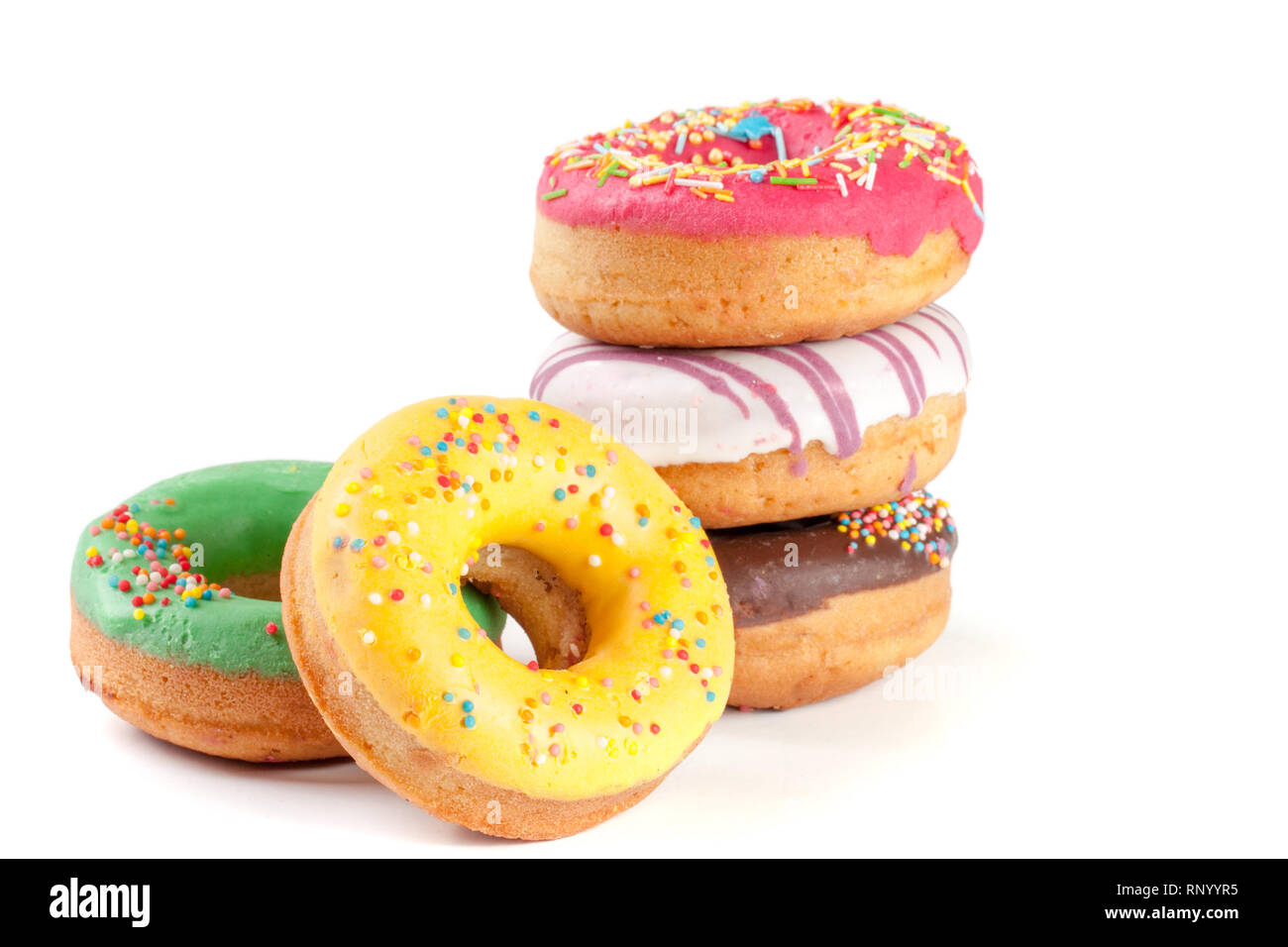 five glazed donut isolated on white background Stock Photo - Alamy